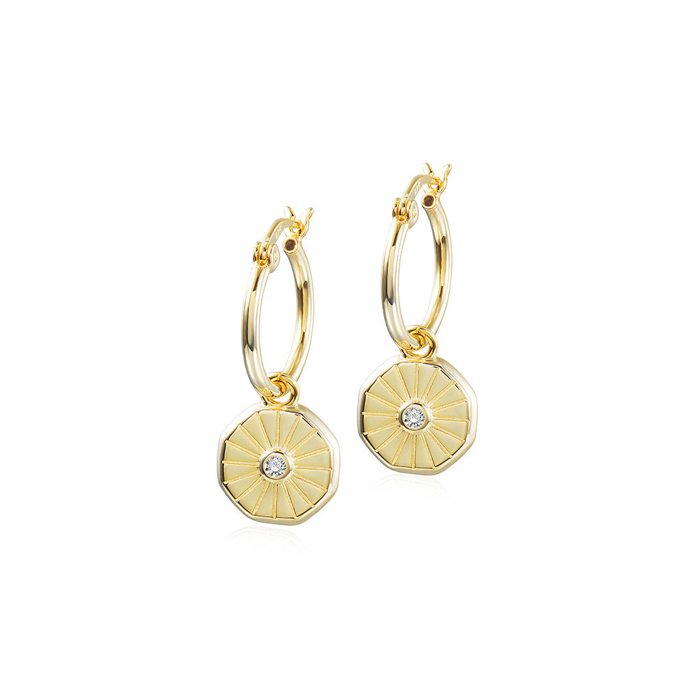 Coin huggie earrings store